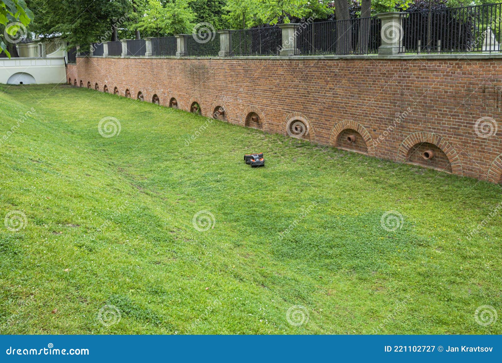Automatic Lawn Mower in the Process of Working Stock Image - Image of ...