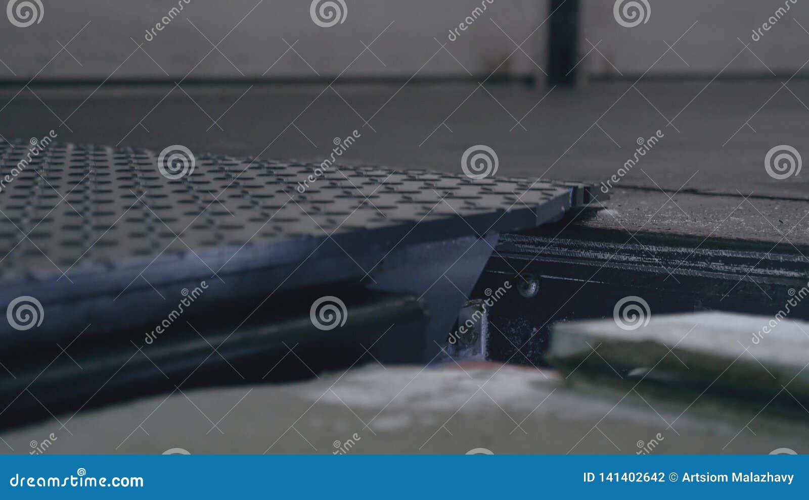 Close-up Automatic Loading Platform Lowered in the Logistics Center ...