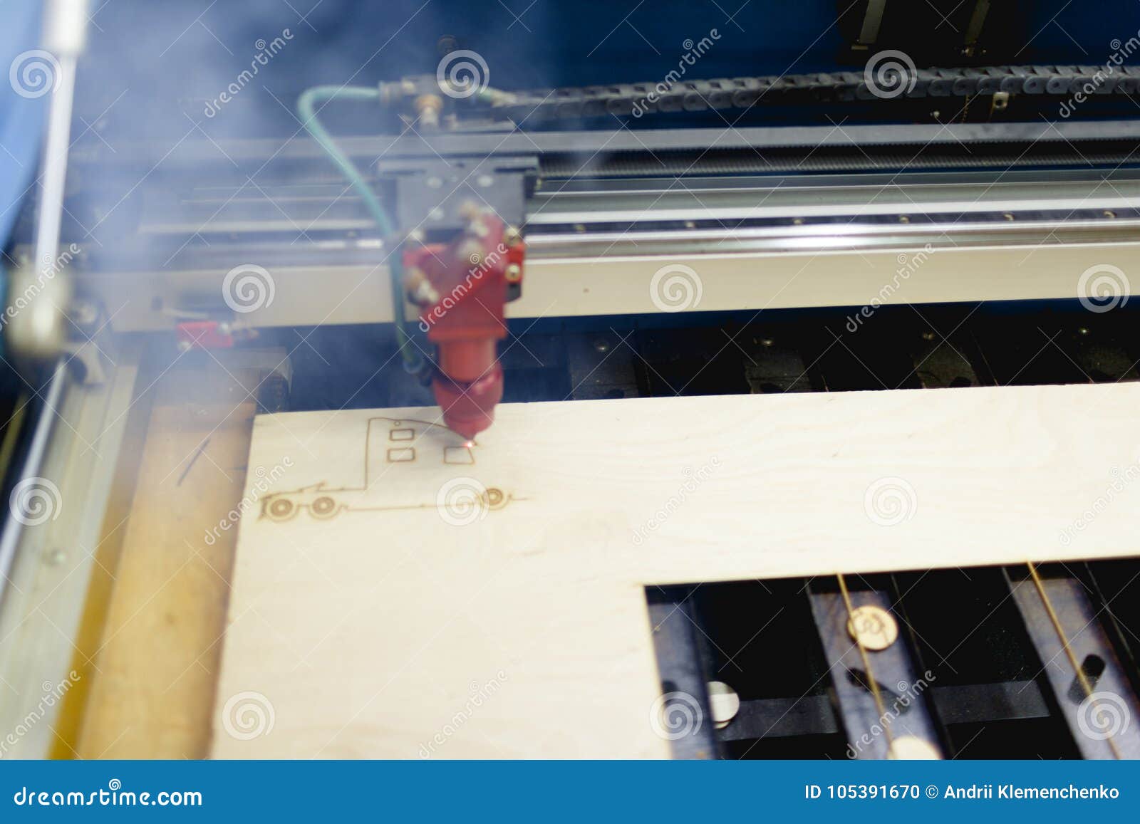 The Automatic Machine Burns the Truck Cab on the Workpiece with a Laser ...
