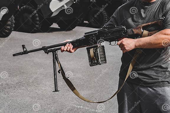 Automatic Machine Gun in the Hands of a Military Man Stock Photo ...