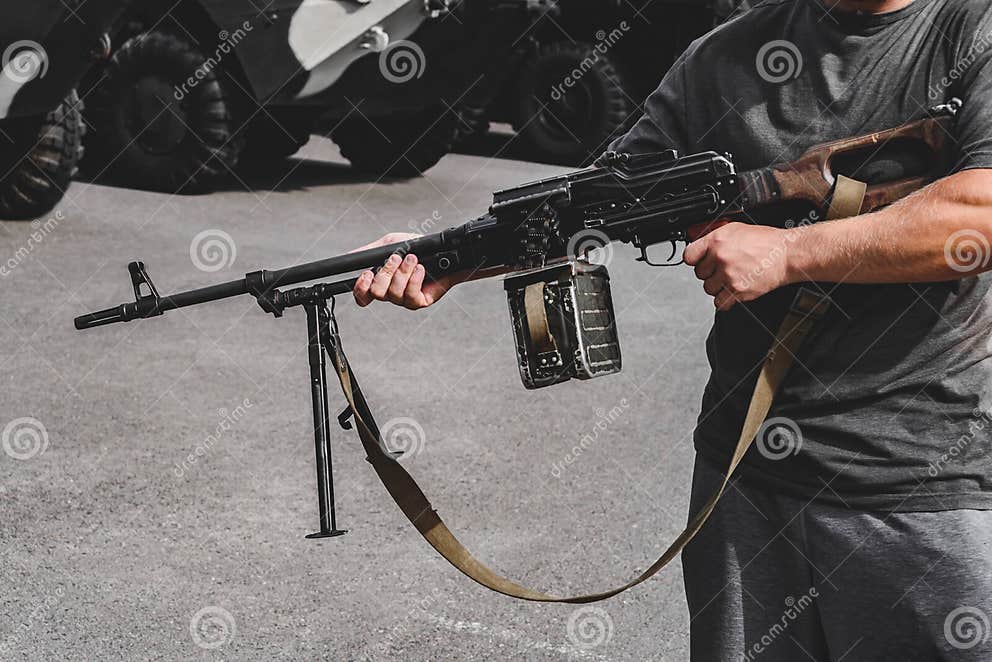 Automatic Machine Gun in the Hands of a Military Man Stock Photo ...