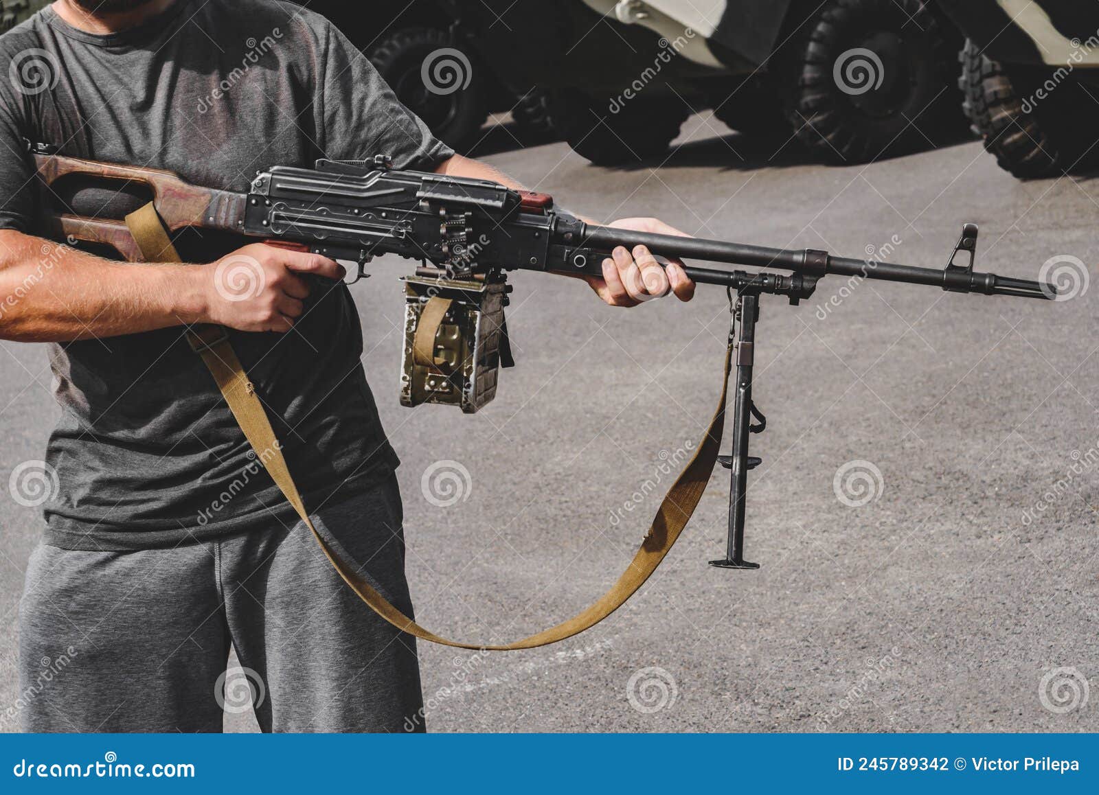 Automatic Machine Gun in the Hands of a Military Man Stock Photo ...