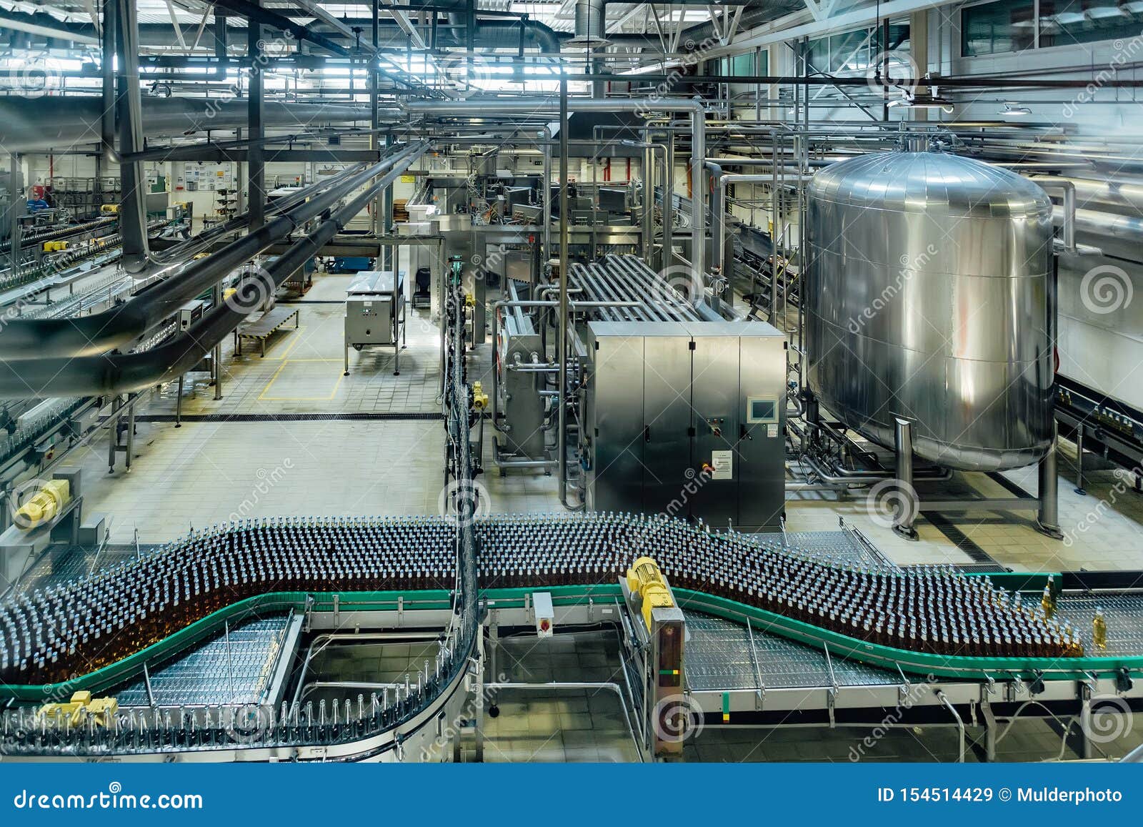 Automatic Modern Production Line at Brewery. Conveyor Line and Vats for ...