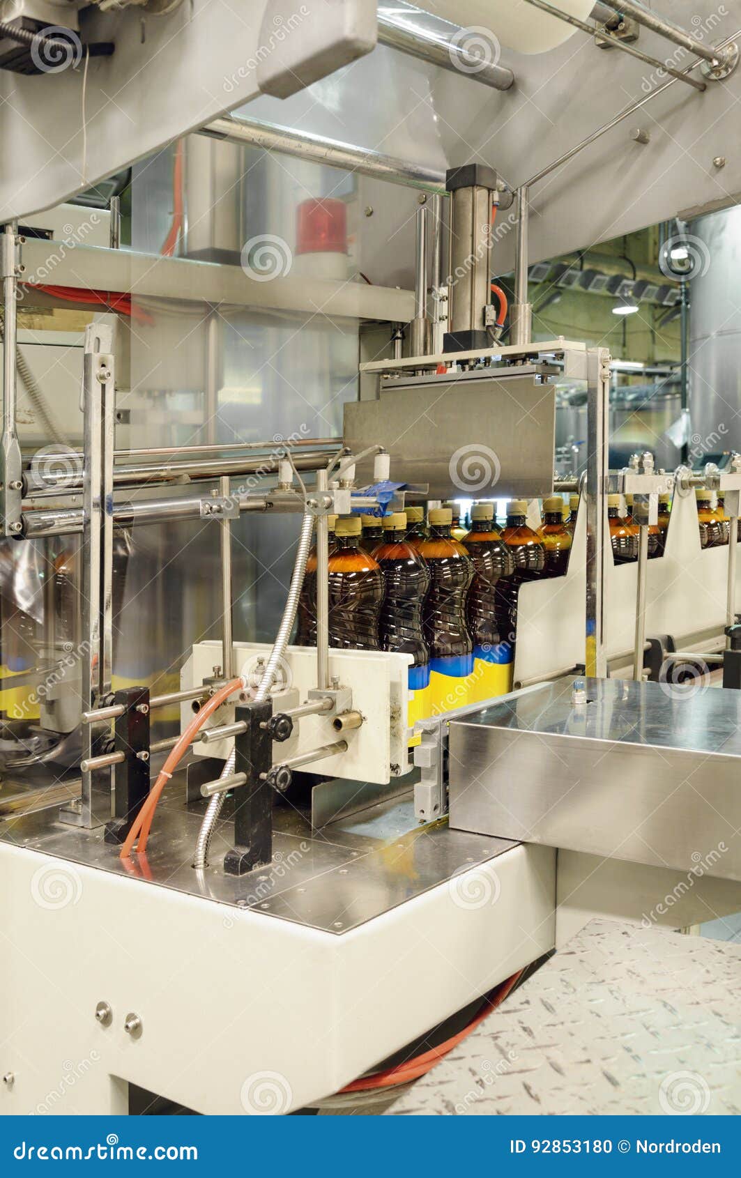 Automatic Packaging Machine Packs Bottles Stock Photo - Image of ...