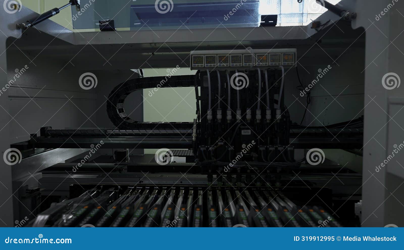 Automatic Pick and Place Machine is Installing Components on Circuit ...