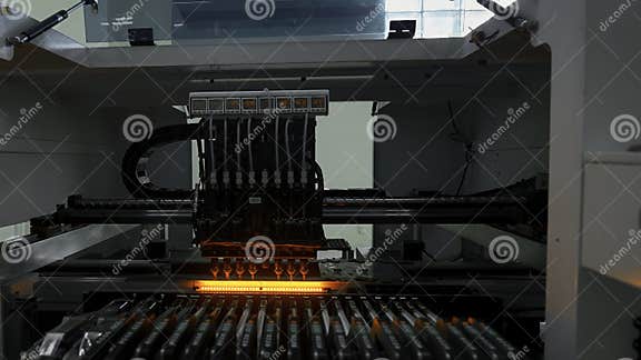 Automatic Pick and Place Machine is Installing Components on Circuit ...