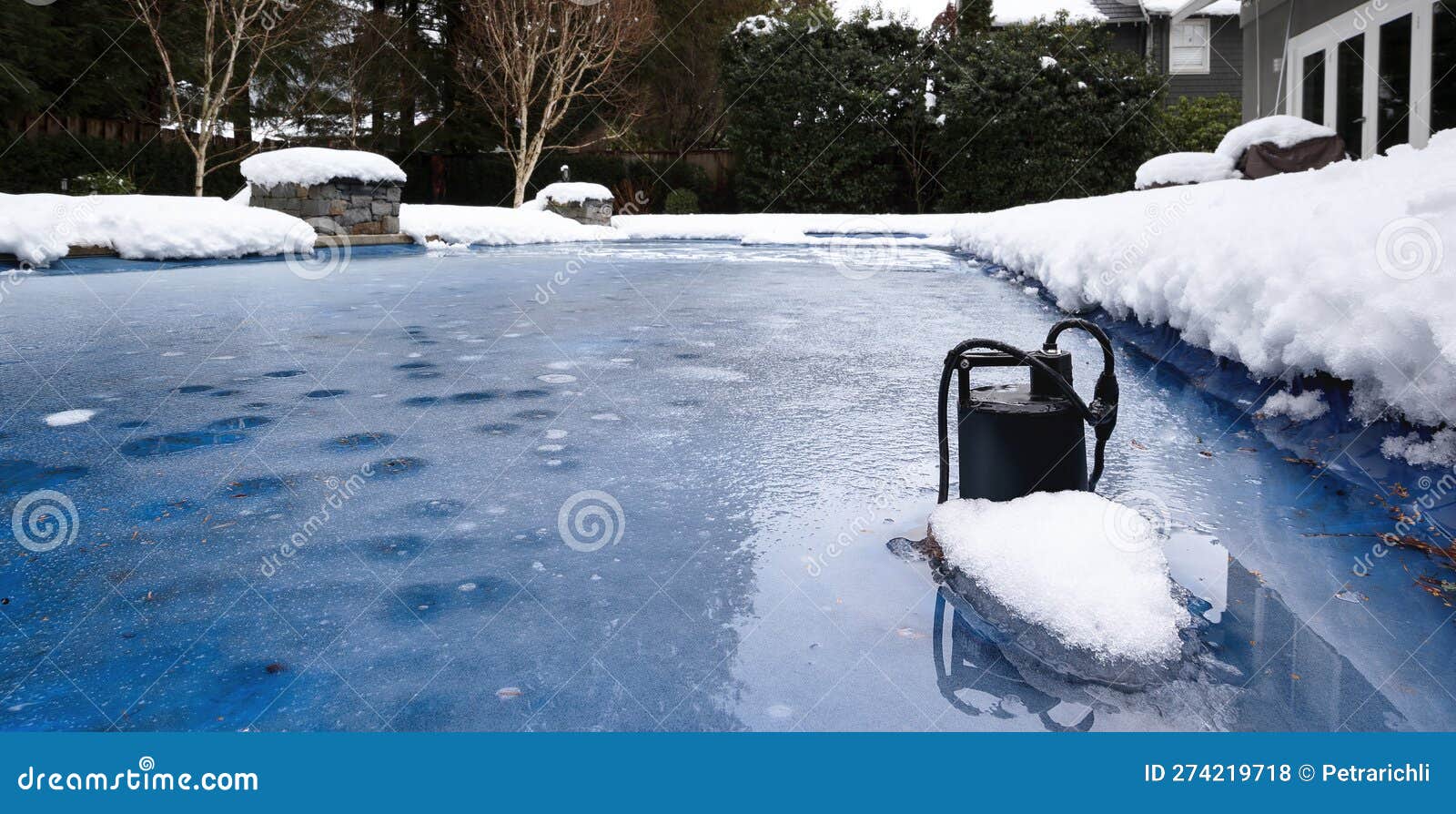 Automatic Pool Pump in Ice and Slush after Snow Storm. Stock Photo ...