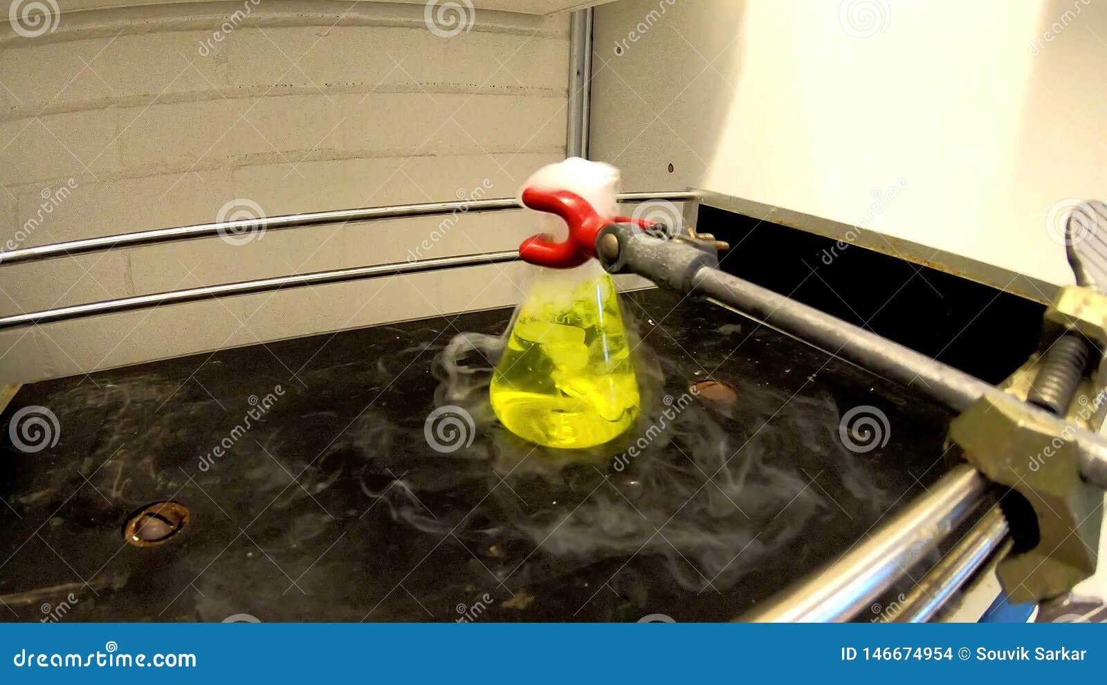 Automatic Shaker in a Chemistry Laboratory with Yellow Color Solution ...