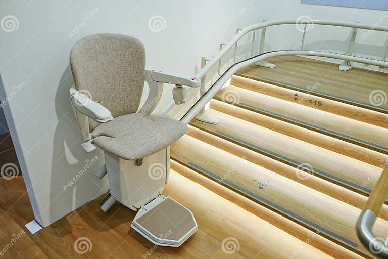 Automatic stair lift. stock photo. Image of staircase - 80267822