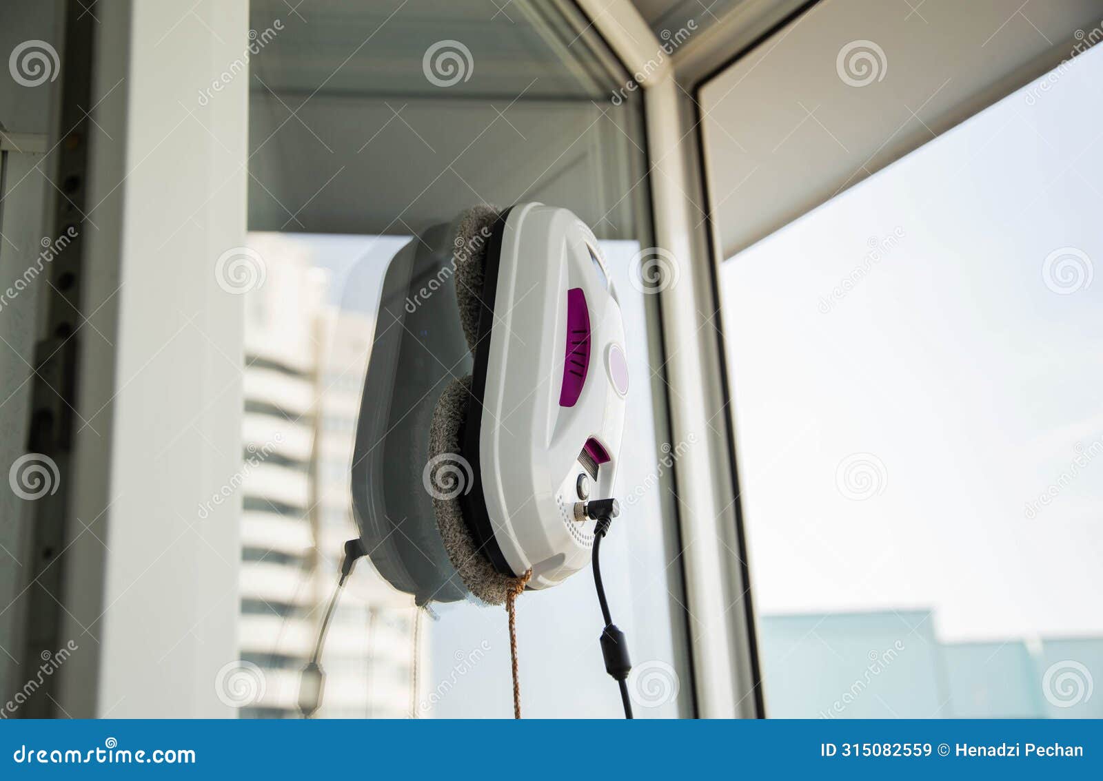 Automatic Vacuum Robot Window Cleaner Washes Glass in the Apartment ...