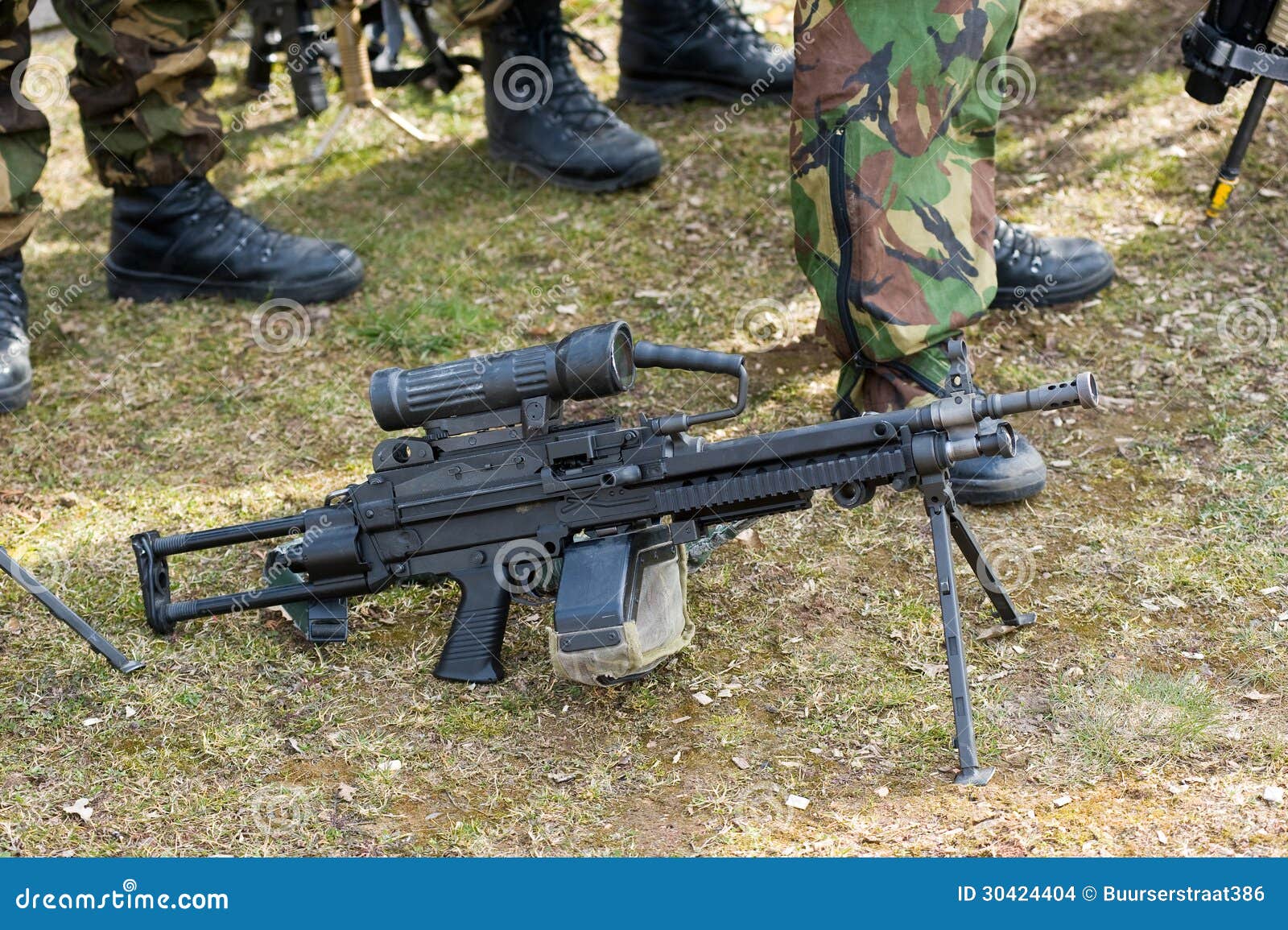 Automatic weapon on ground stock photo. Image of armed - 30424404