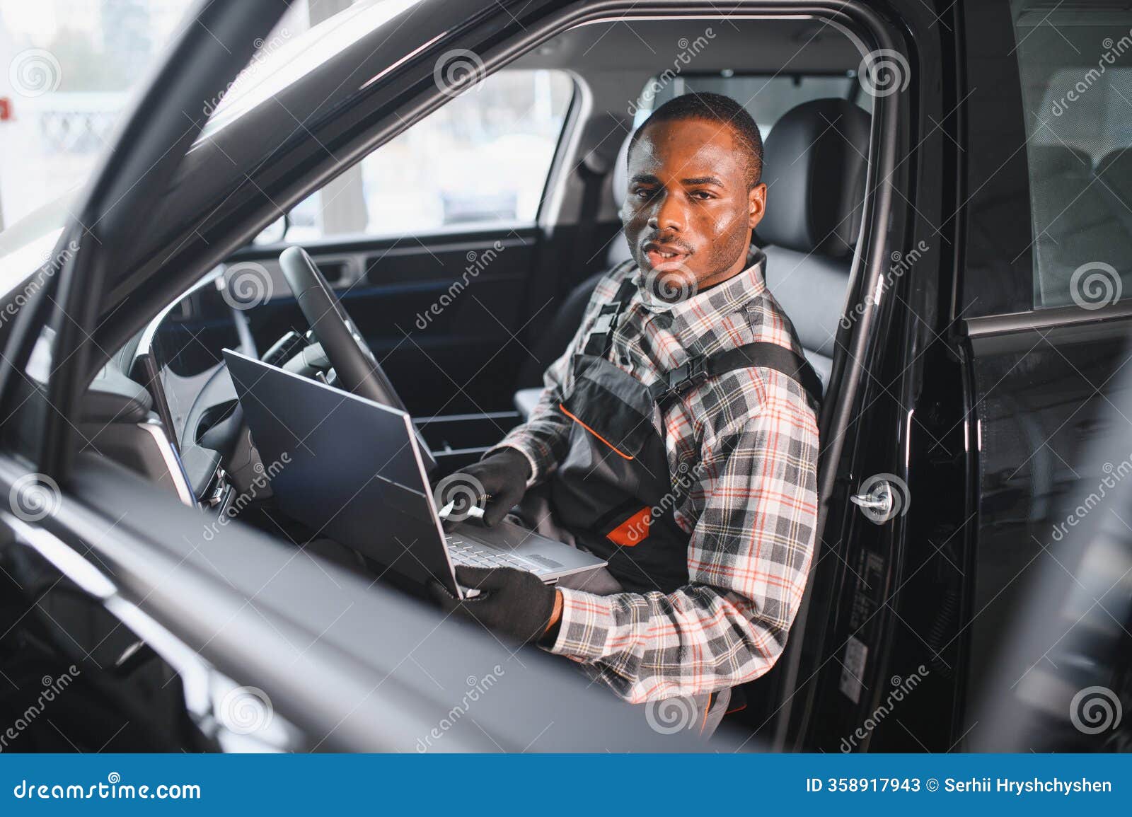 Automobile Computer Diagnosis. Car Mechanic Repairer Looks for Engine ...