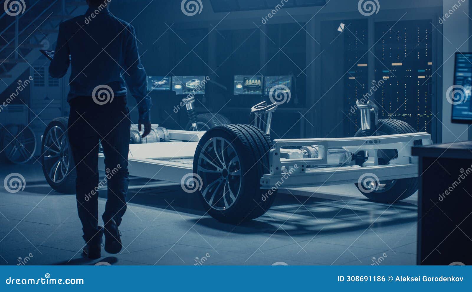 Automobile Engineer Working On Electric Car Chassis Platform, Using ...