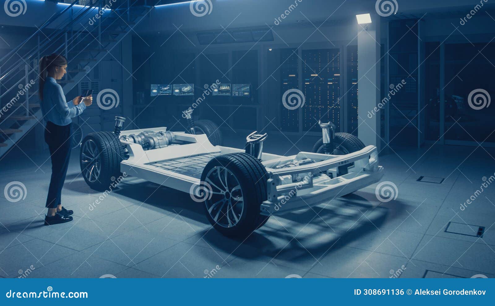 Automobile Engineer Working on Electric Car Chassis Platform, Using ...