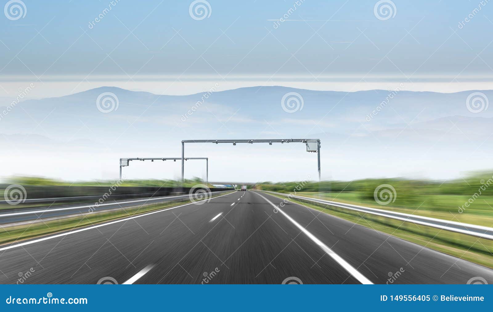 Automobile Highway on the Background of Mountains and a Bridge Over the ...
