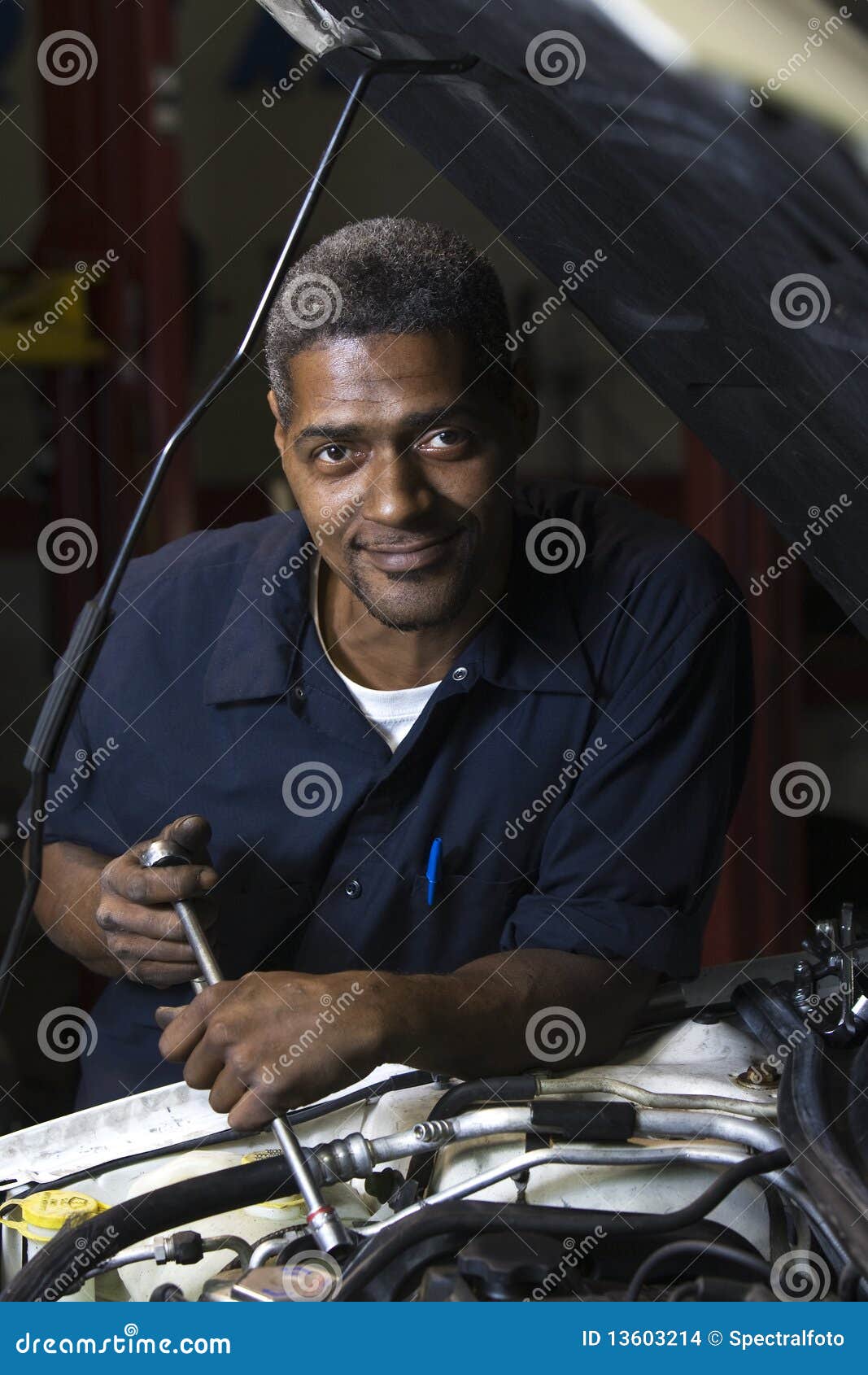 Automobile Mechanic Smiling Stock Photo - Image of person, smile: 13603214