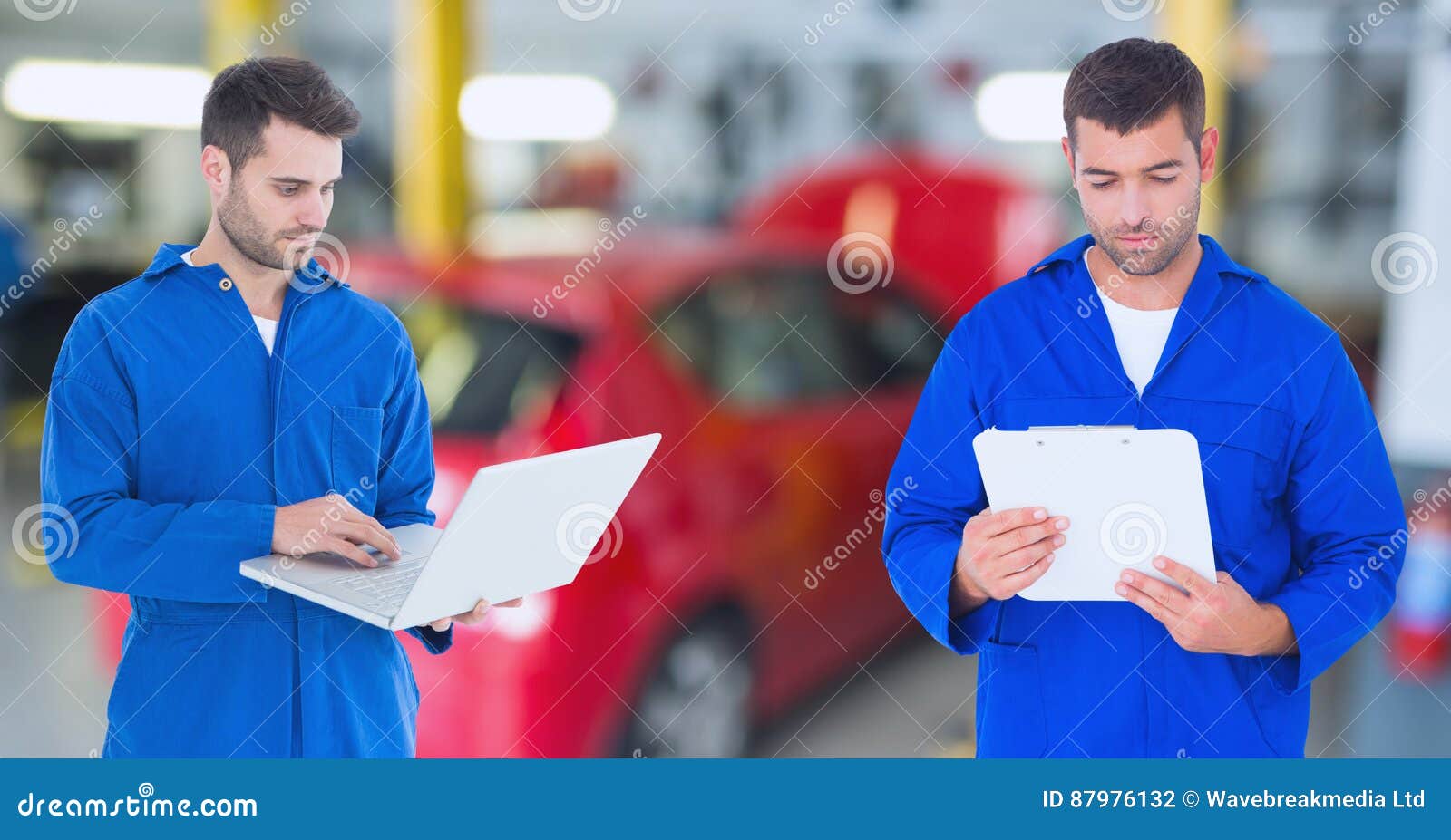 Automobile Mechanics Using Laptop and Digital Tablet in Workshop Stock ...