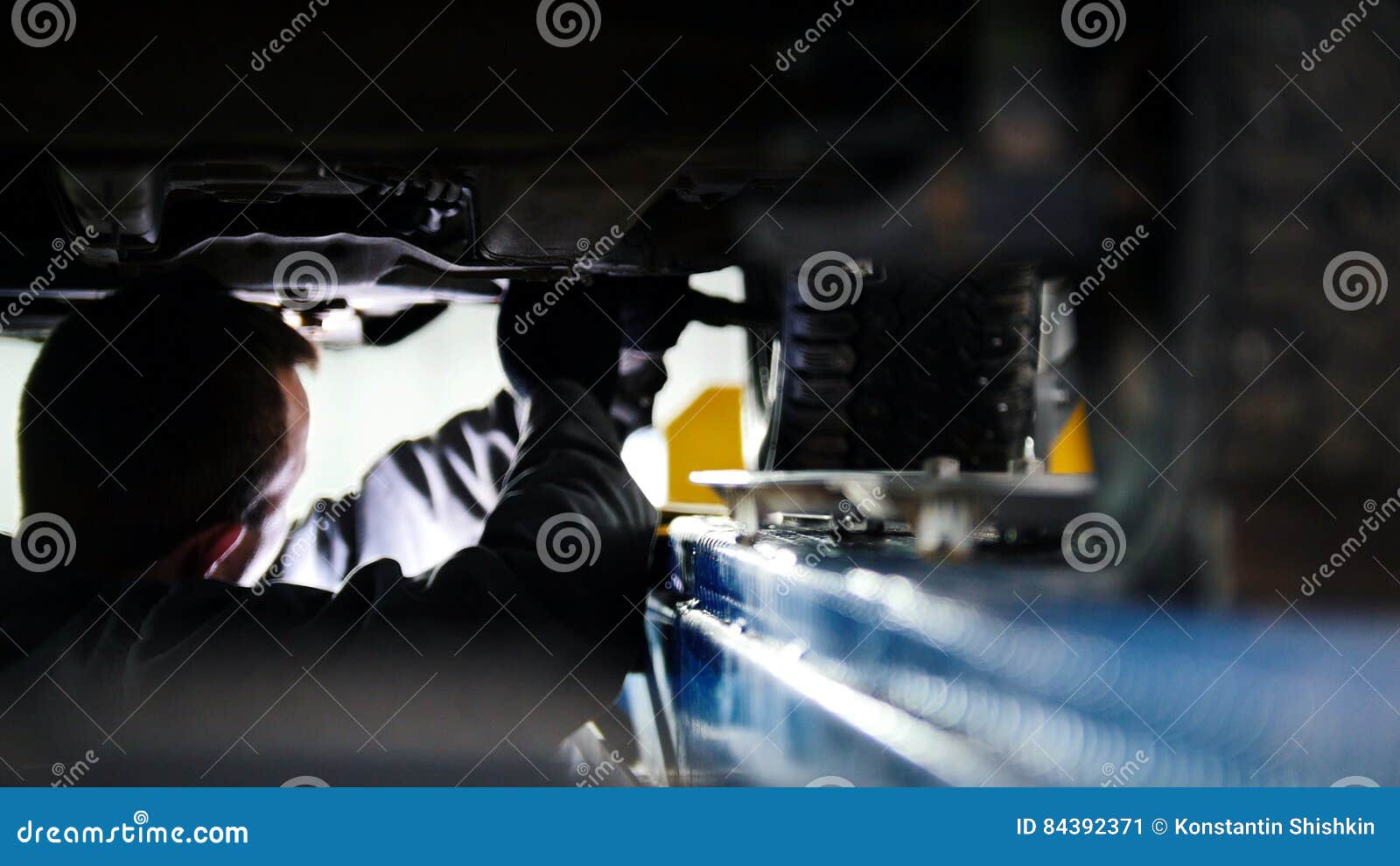 Automobile Service - Two Mechanics Standing Near Lifted Royalty-Free ...