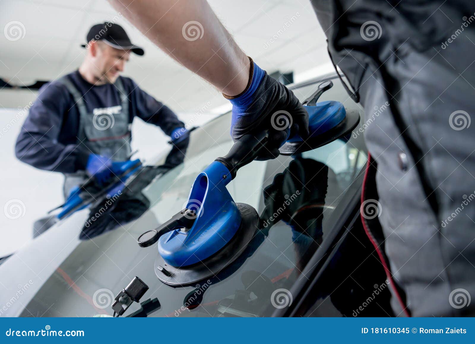 Automobile Special Workers Replacing Windscreen of a Car in Auto ...
