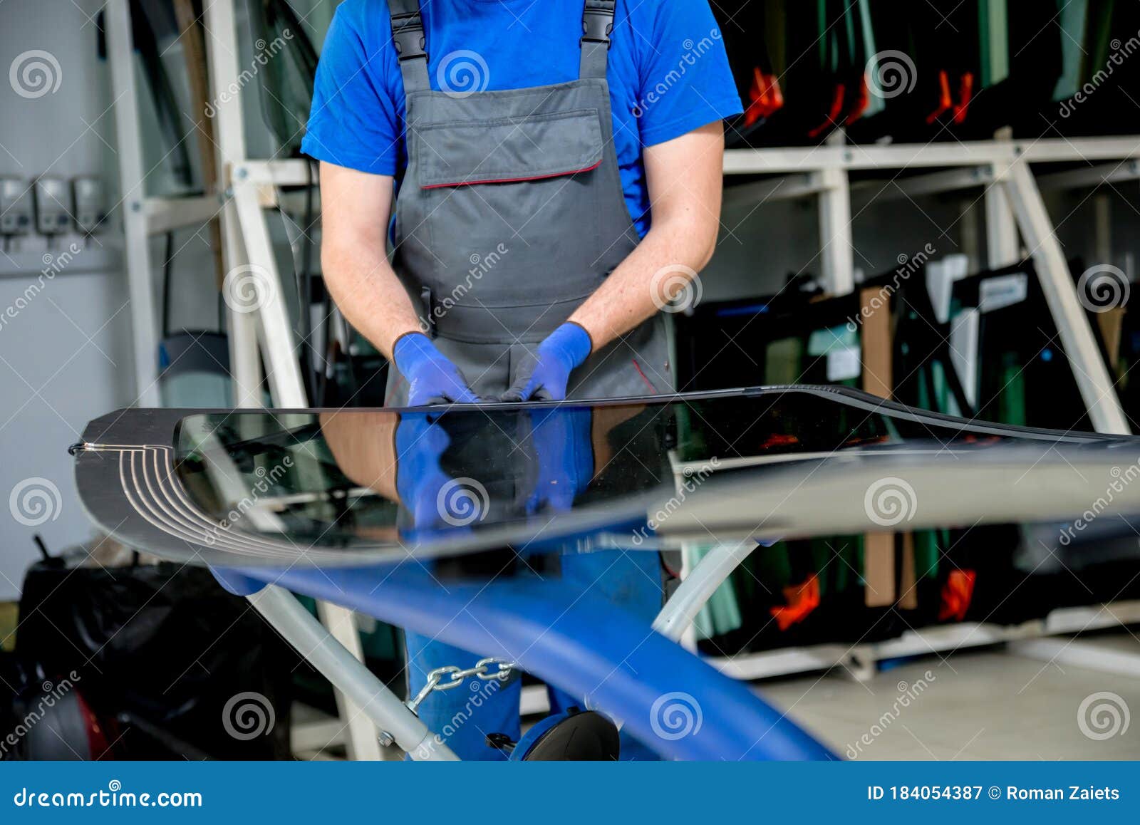 Automobile Special Workers Replacing Windscreen of a Car in Auto ...