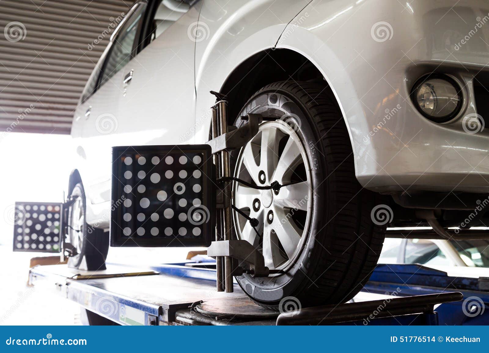 Automobile wheel alignment stock photo. Image of closeup - 51776514