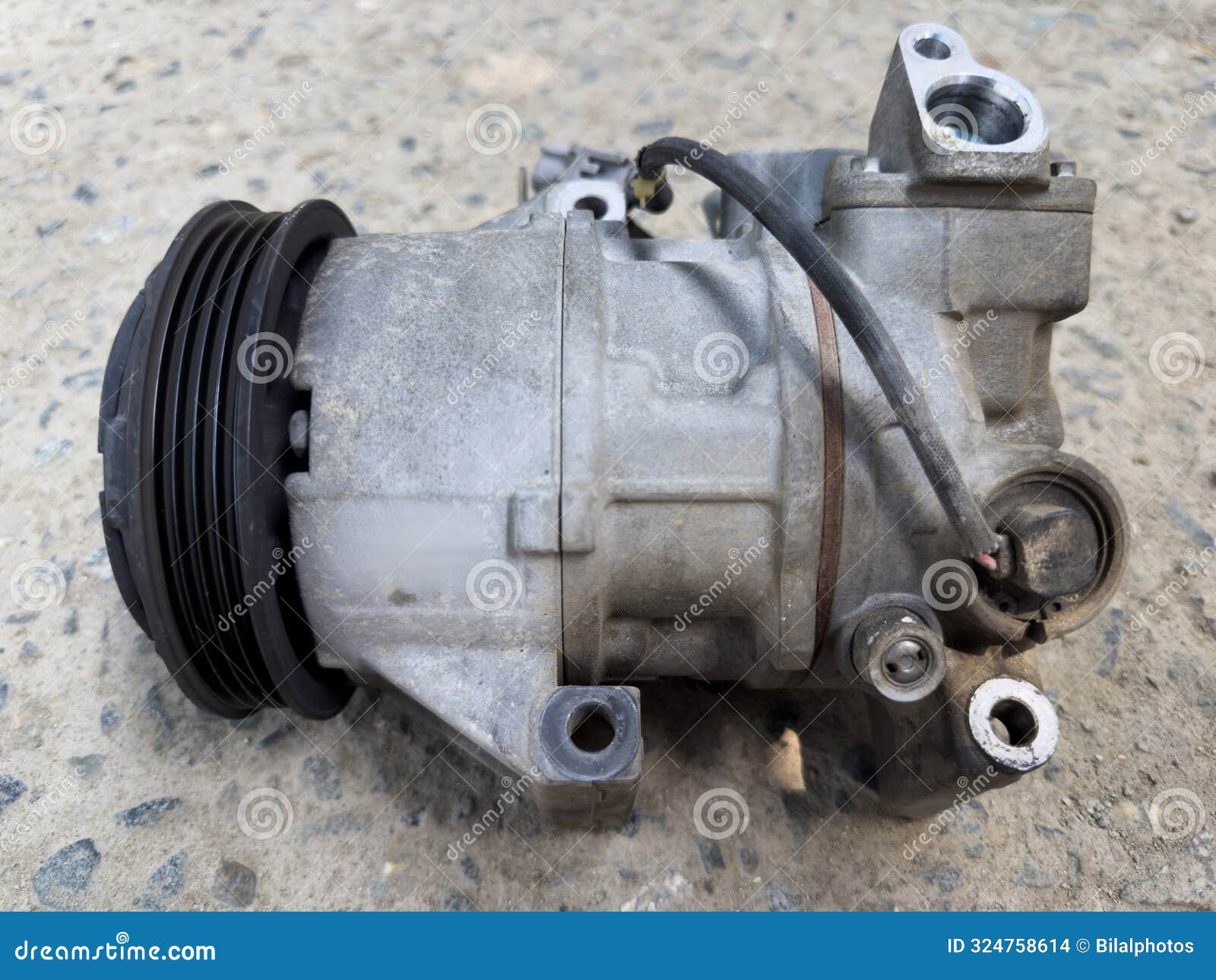Automotive Air Conditioning Compressor on Ground Closeup View Stock ...