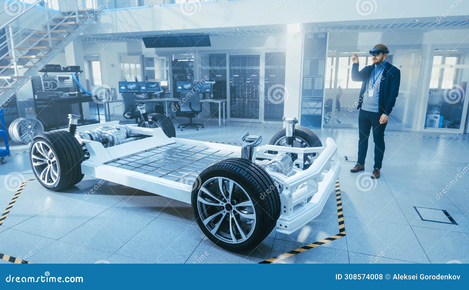 Automotive Engineer Working on Electric Car Chassis Platform, Using ...