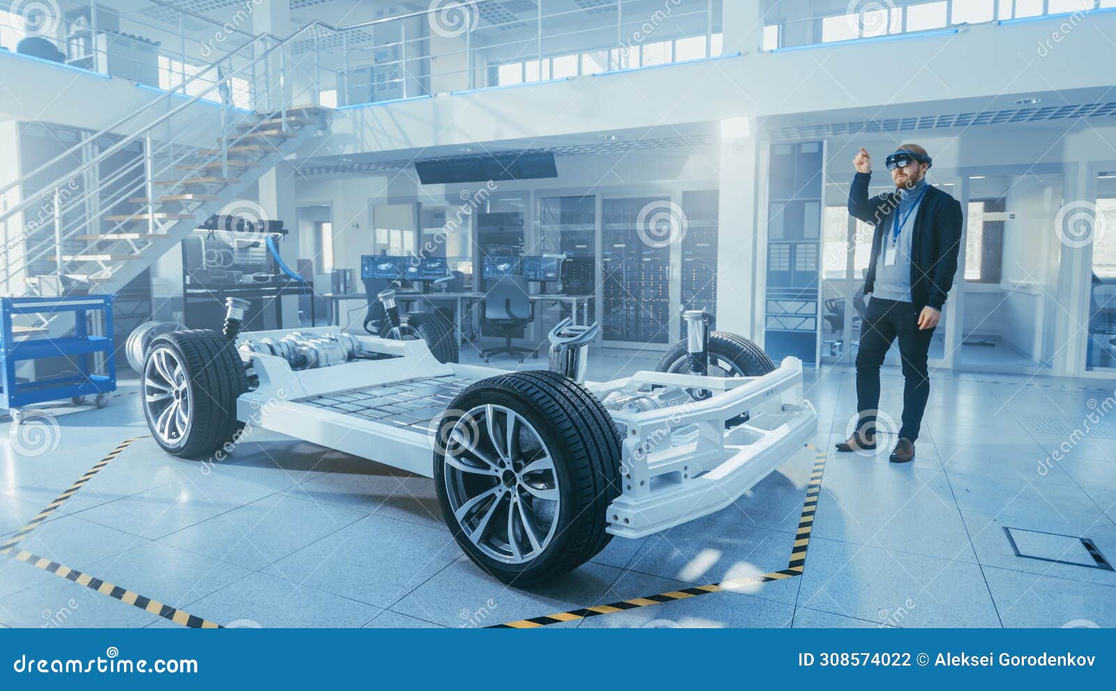 Automotive Engineer Working on Electric Car Chassis Platform, Using ...