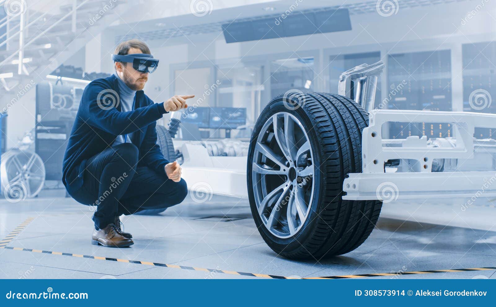 Automotive Engineer Working on Electric Car Chassis Platform, Using ...