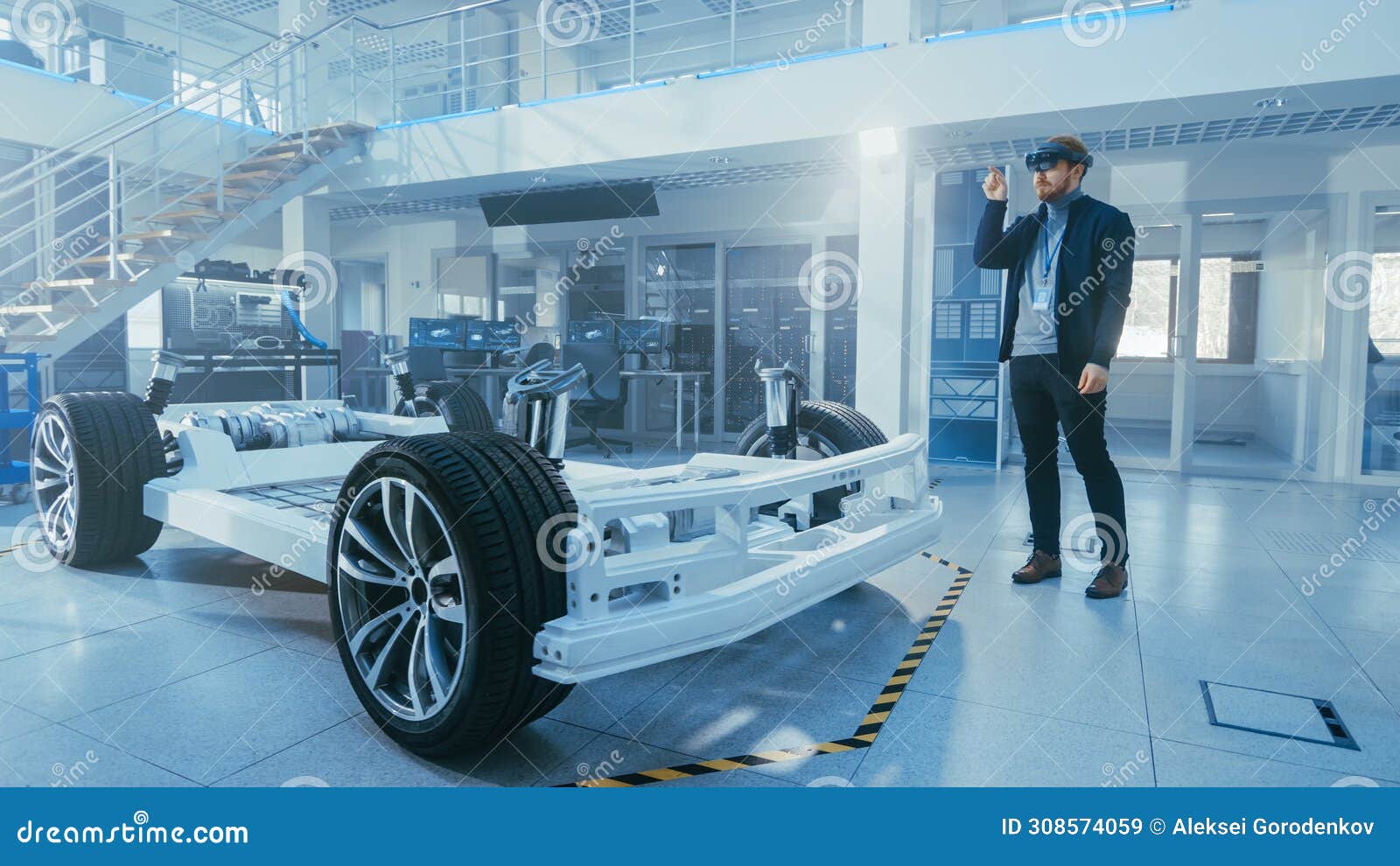 Automotive Engineer Working on Electric Car Chassis Platform, Using ...