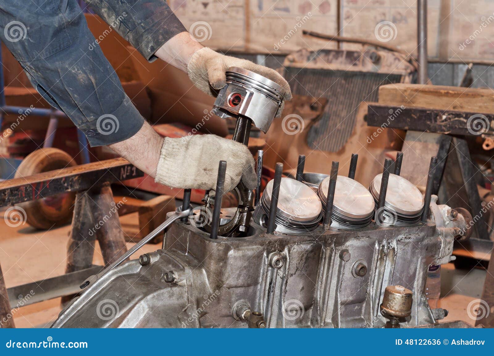 Automotive Mechanic Disassembling Car Engine with Spanner during Stock ...