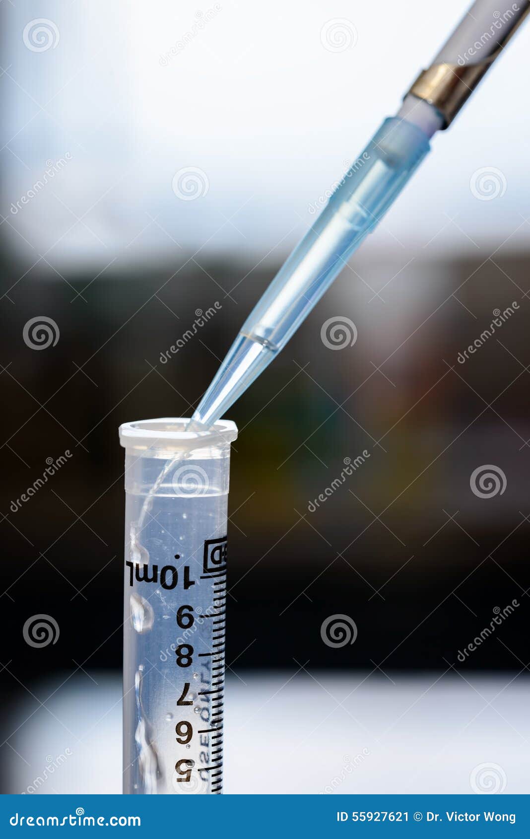 Autopipetting - Dispensing a Solution Stock Image - Image of liquid ...