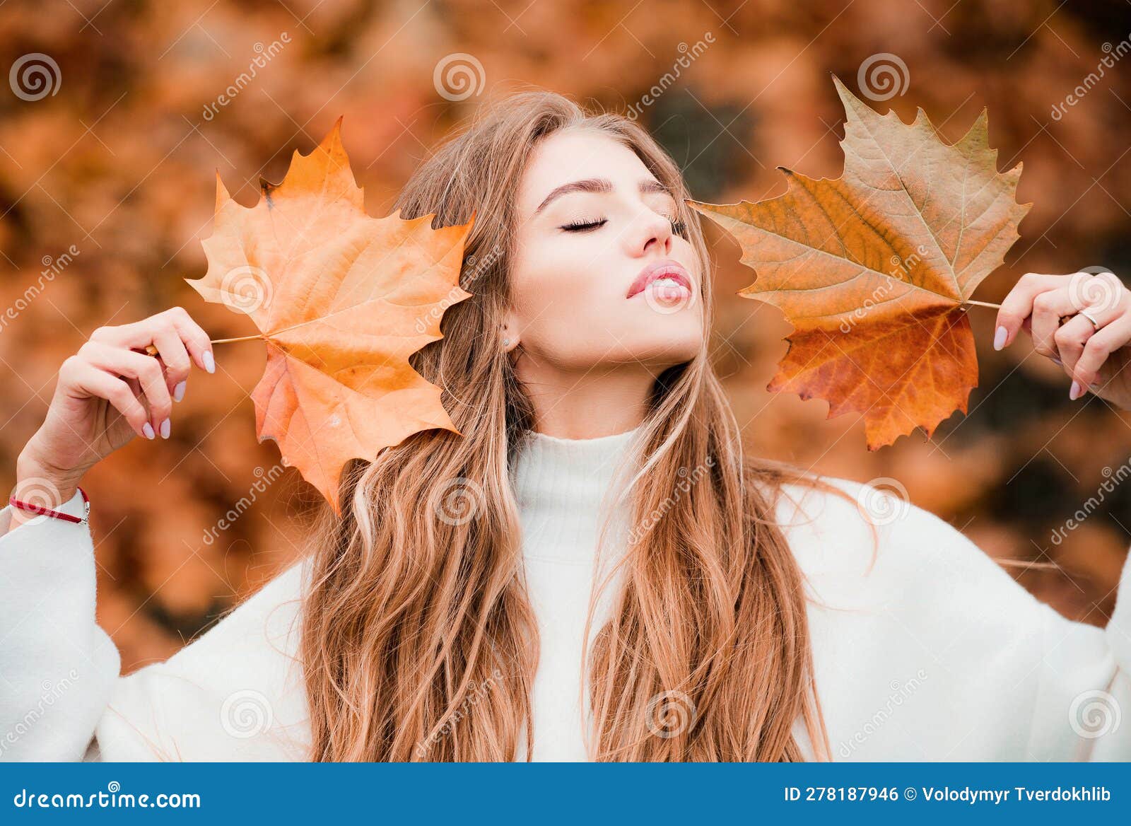 Autumn Beauty Woman Fashion Wodel With Fall Maple Leaf Outdoors