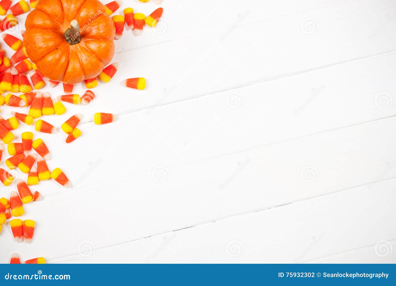 Autumn: Candy Corn and Pumpkin Background Stock Photo - Image of ...