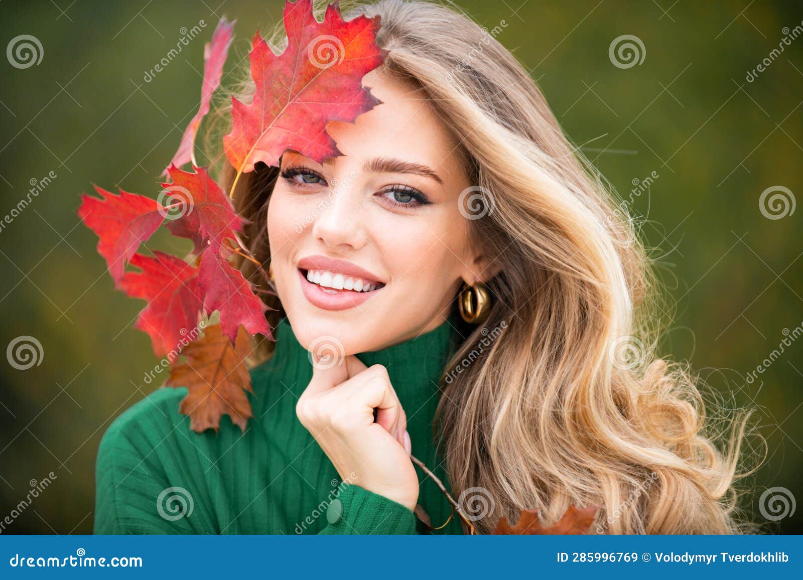 Autumn Portrait Of Cheerful Woman With Yellow Maple Leaves Portrait Of