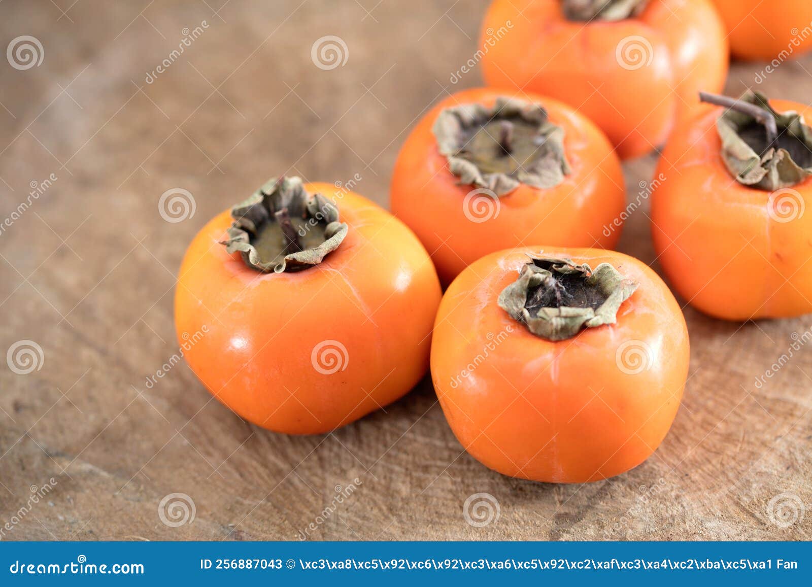 Autumn Ripe Red Persimmons on Cutting Board Stock Image - Image of ...