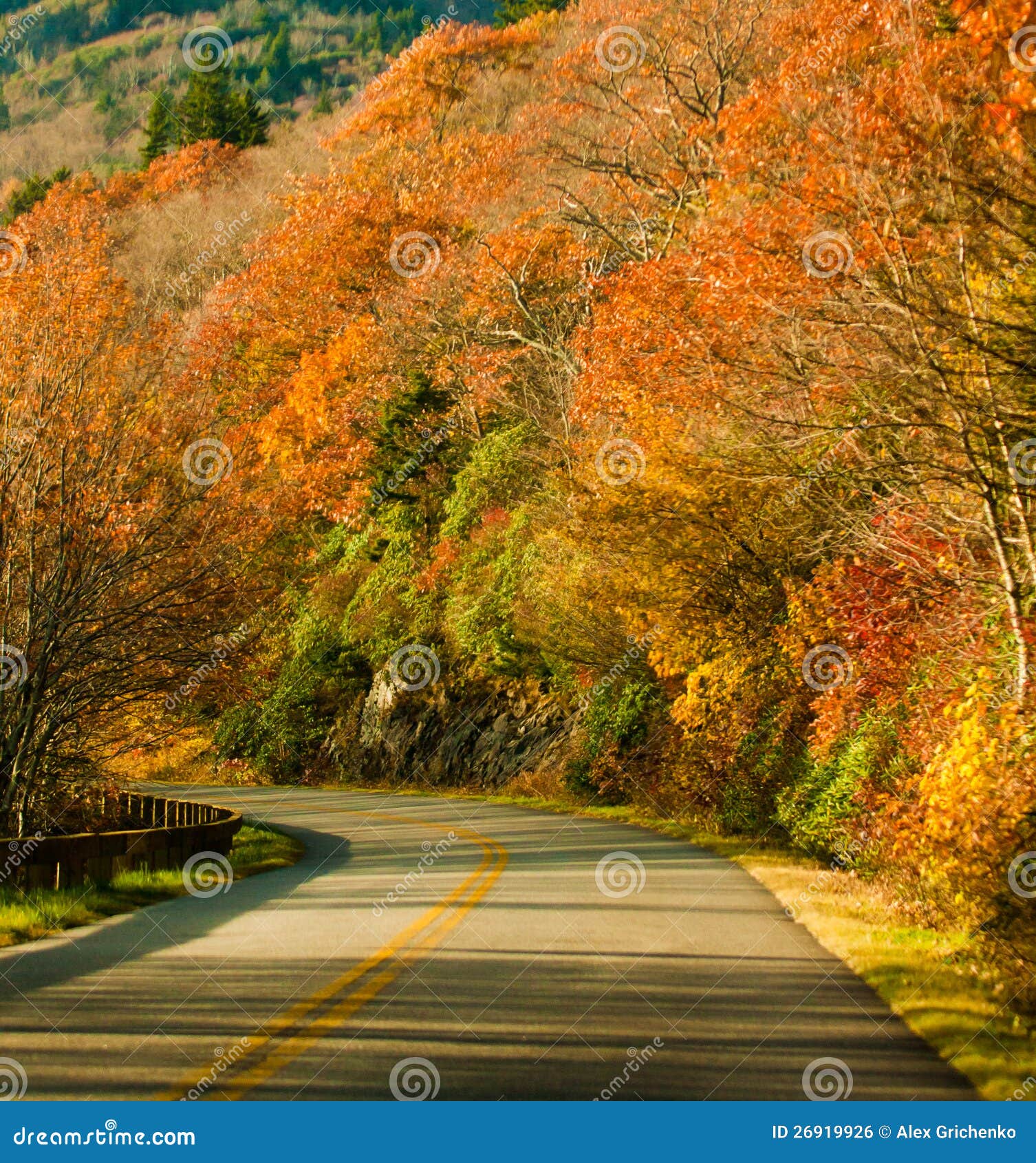 Autumn scene on the road stock photo. Image of mountains - 26919926
