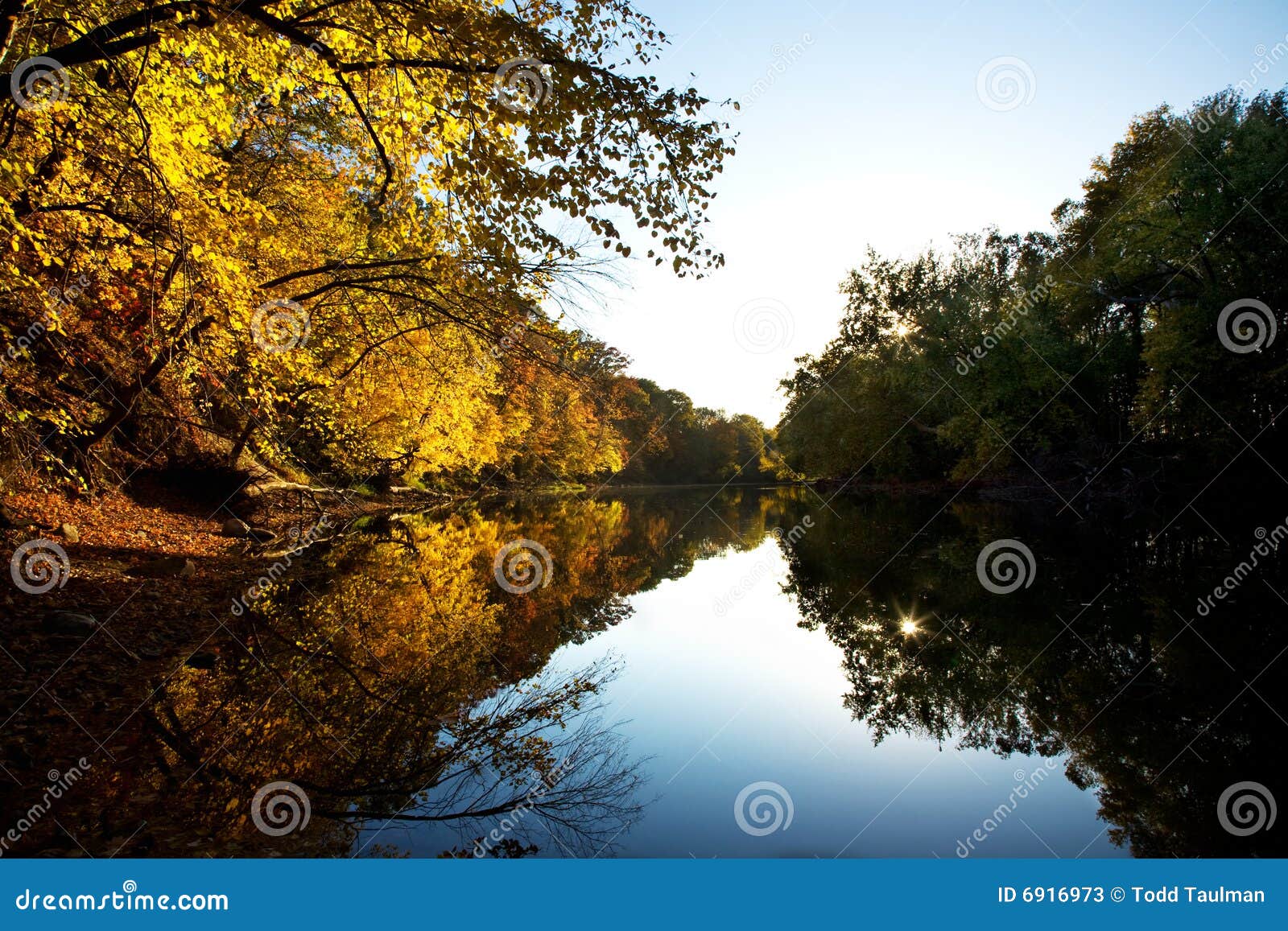 Autumn Sunset Along the River Stock Image - Image of serene, yellow ...
