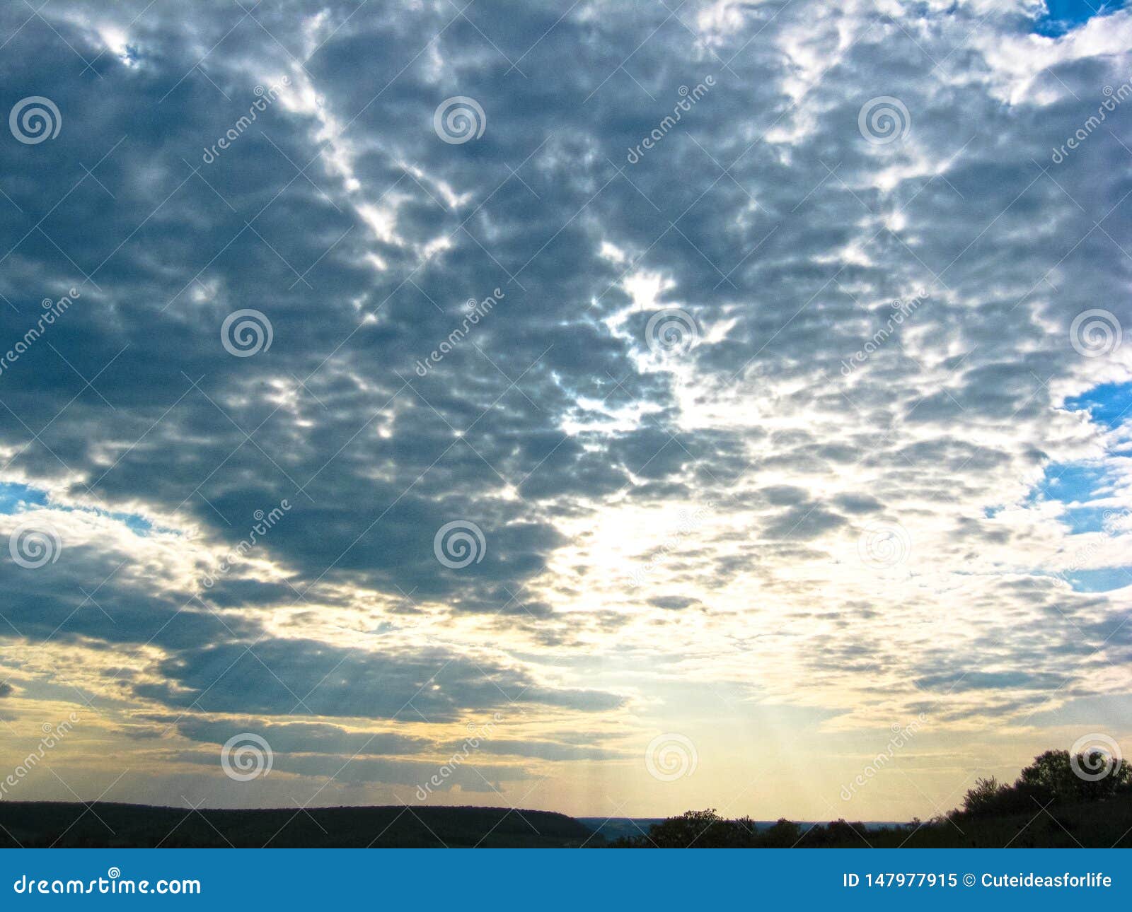 Autumn Sunset. the Sun`s Rays of the Evening Sun Break through the ...