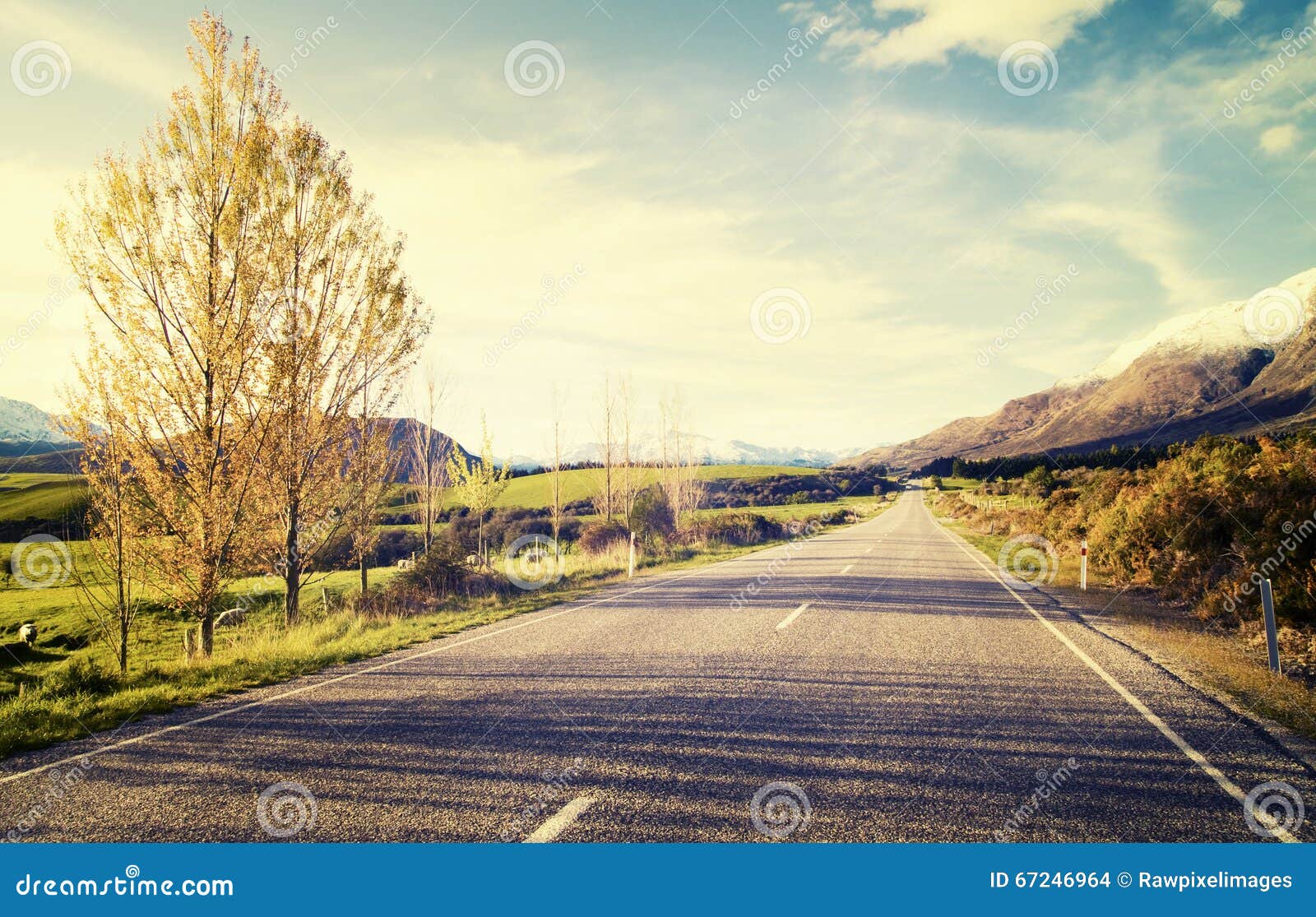 Autumn Themed Country Road with Mountain Range Concept Stock Photo ...
