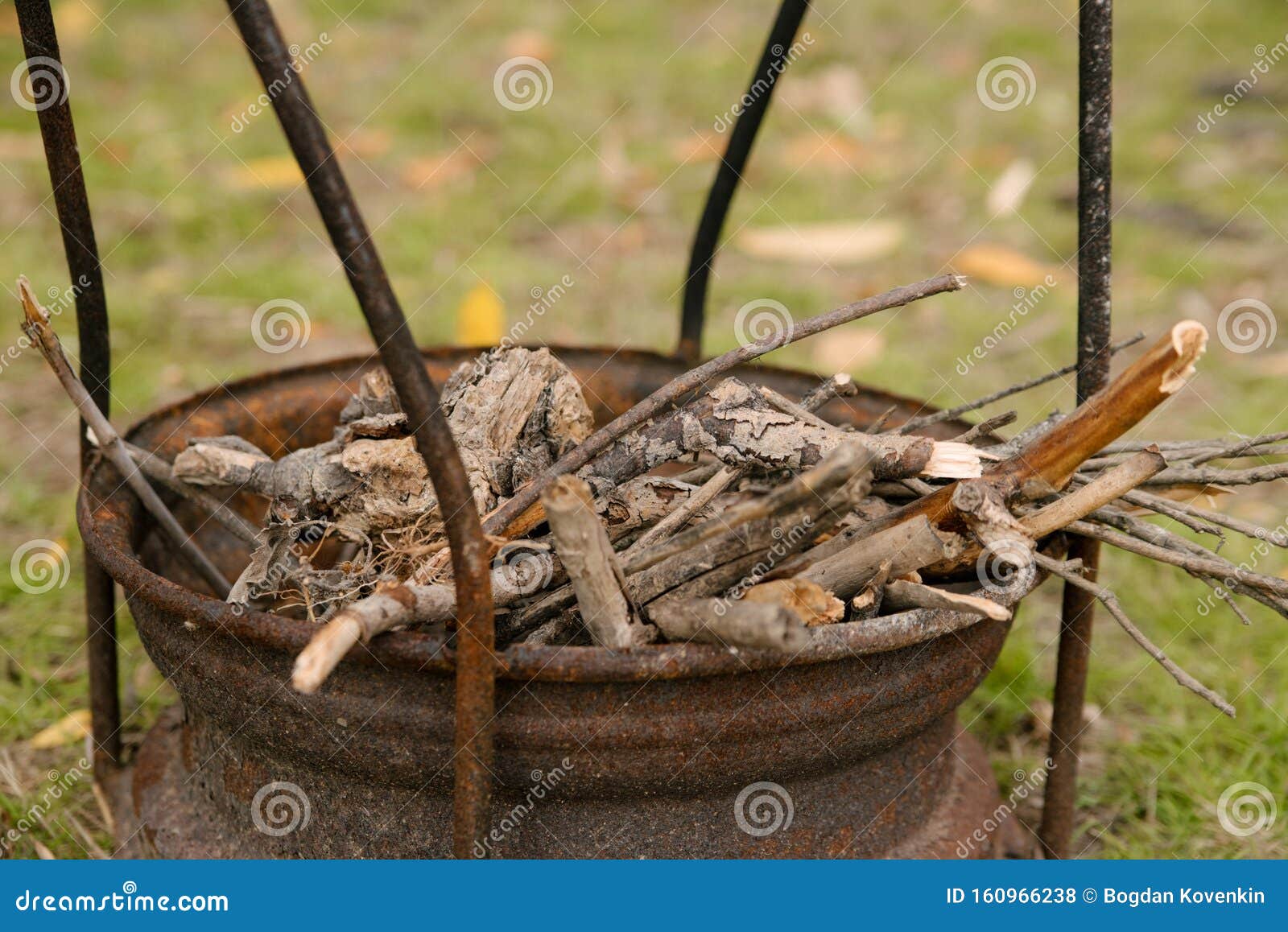 Autumn Vacation Concept. Man Hiker Make Fire in Forest Stock Photo ...