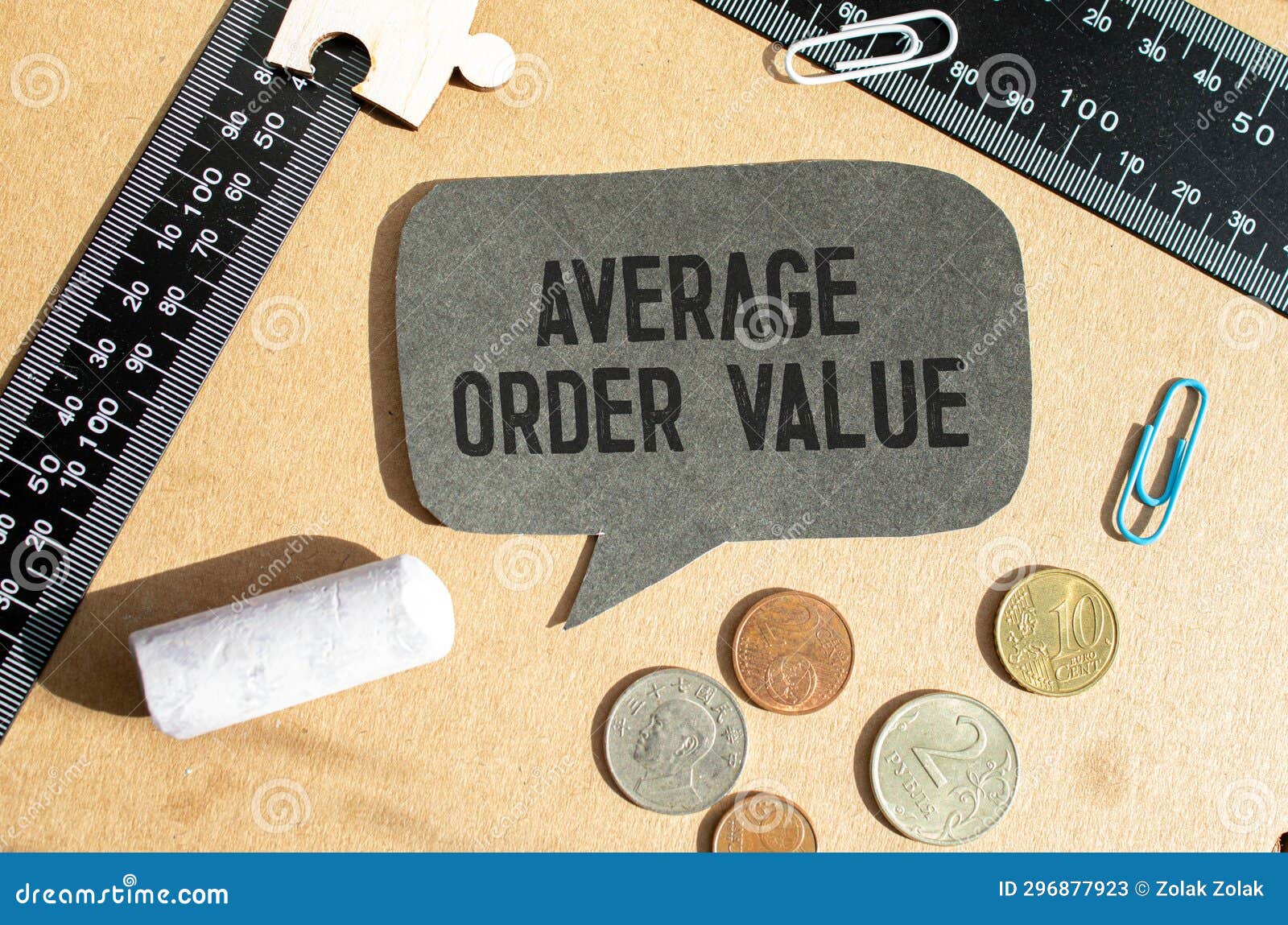 AVERAGE ORDER VALUE. Black Marker on Torn Cardboard Background Stock ...