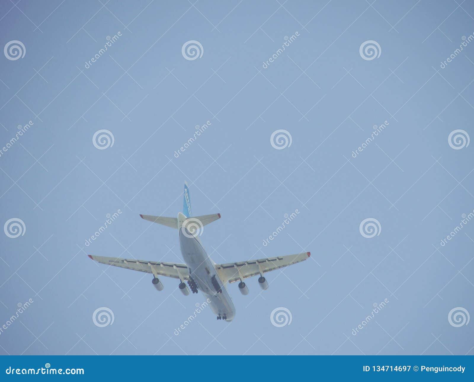 Plane in the sky editorial photography. Image of transportation - 134714697