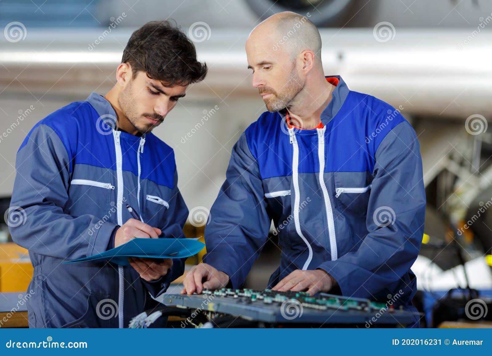 Aviation Assembling Team at Work Stock Image - Image of professional ... Aviation Assembling Team at Work Stock Image - Image of professional ...