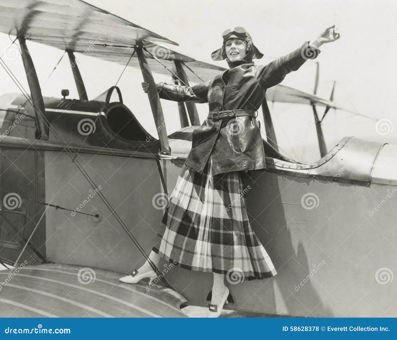 Aviatrix Standing on Bi-plane Stock Photo - Image of away, aviatrix ...