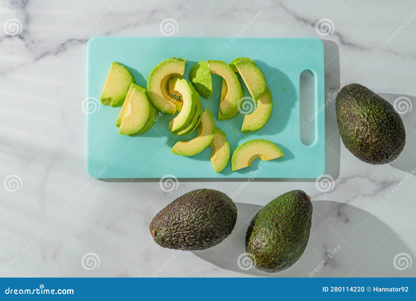 Avocado Close-up on the Kitchen Table. Fresh Sliced Avocado on a ...