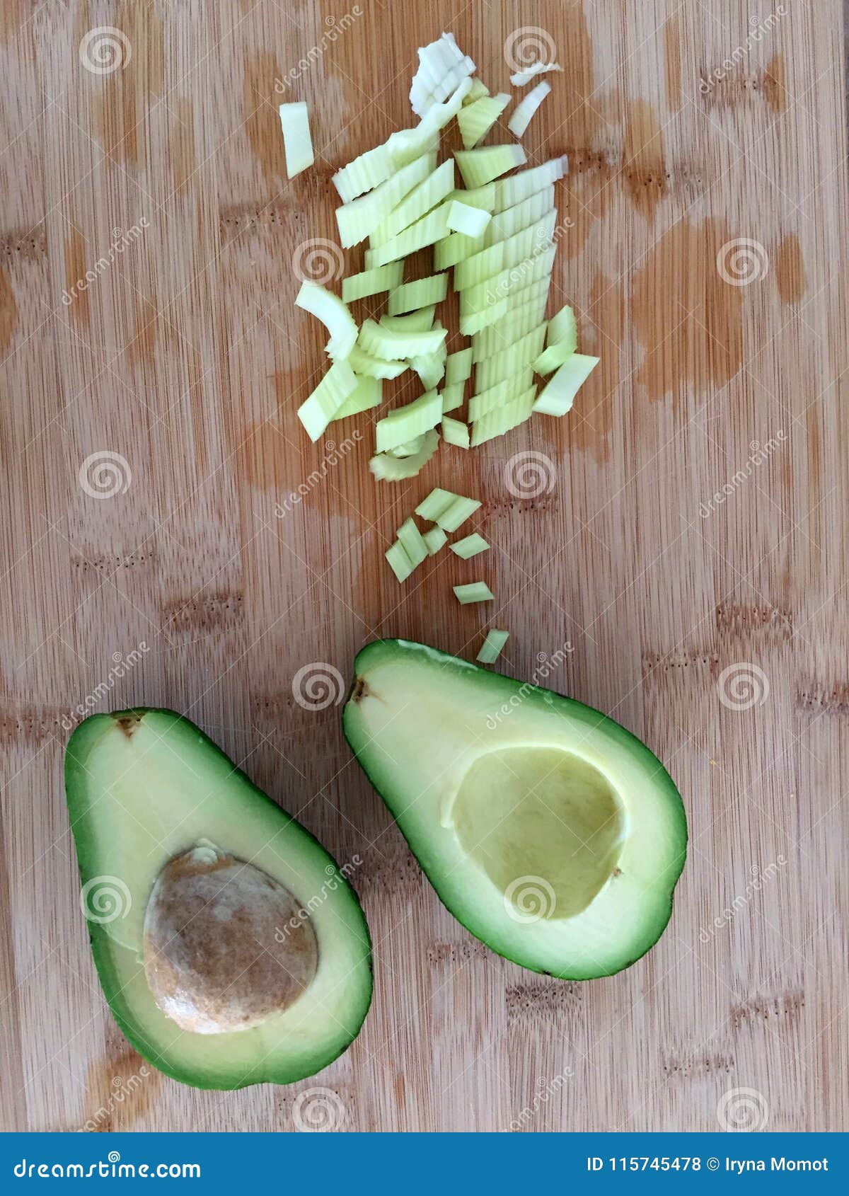 Avocado cut on the board stock photo. Image of tropical - 115745478
