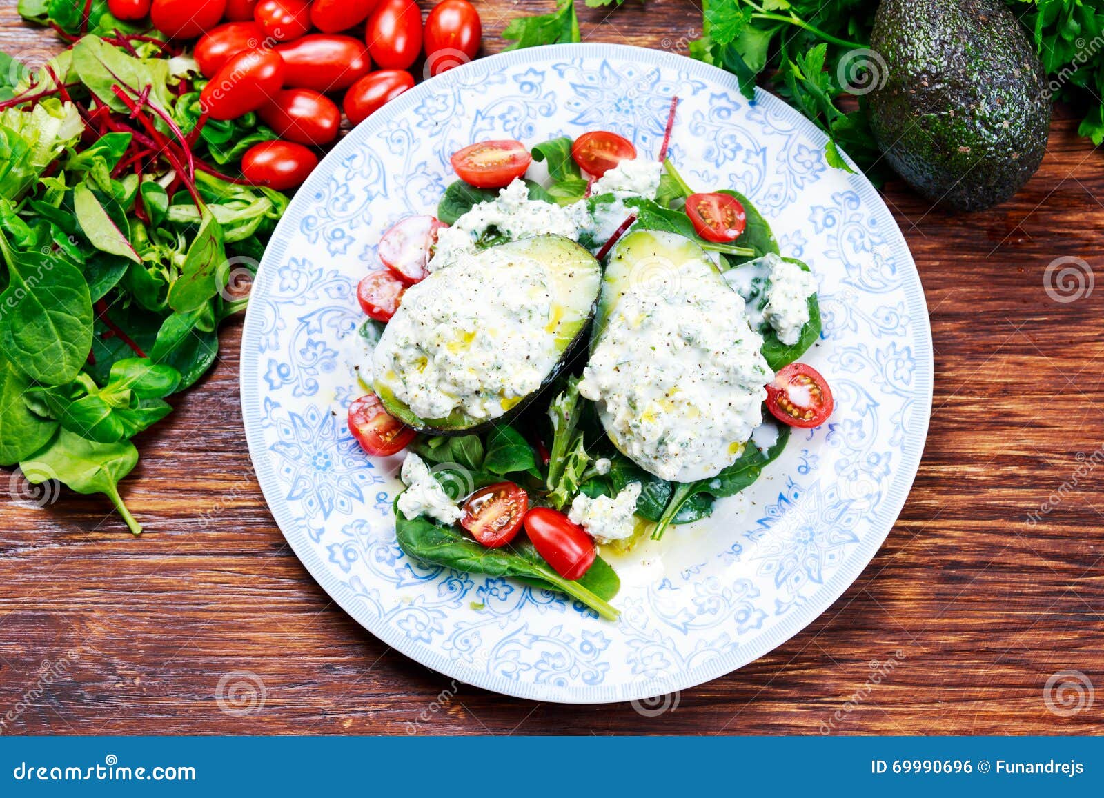 Avocado Halves Stuffed with Cottage Cheese and Vegetables Stock Photo ...