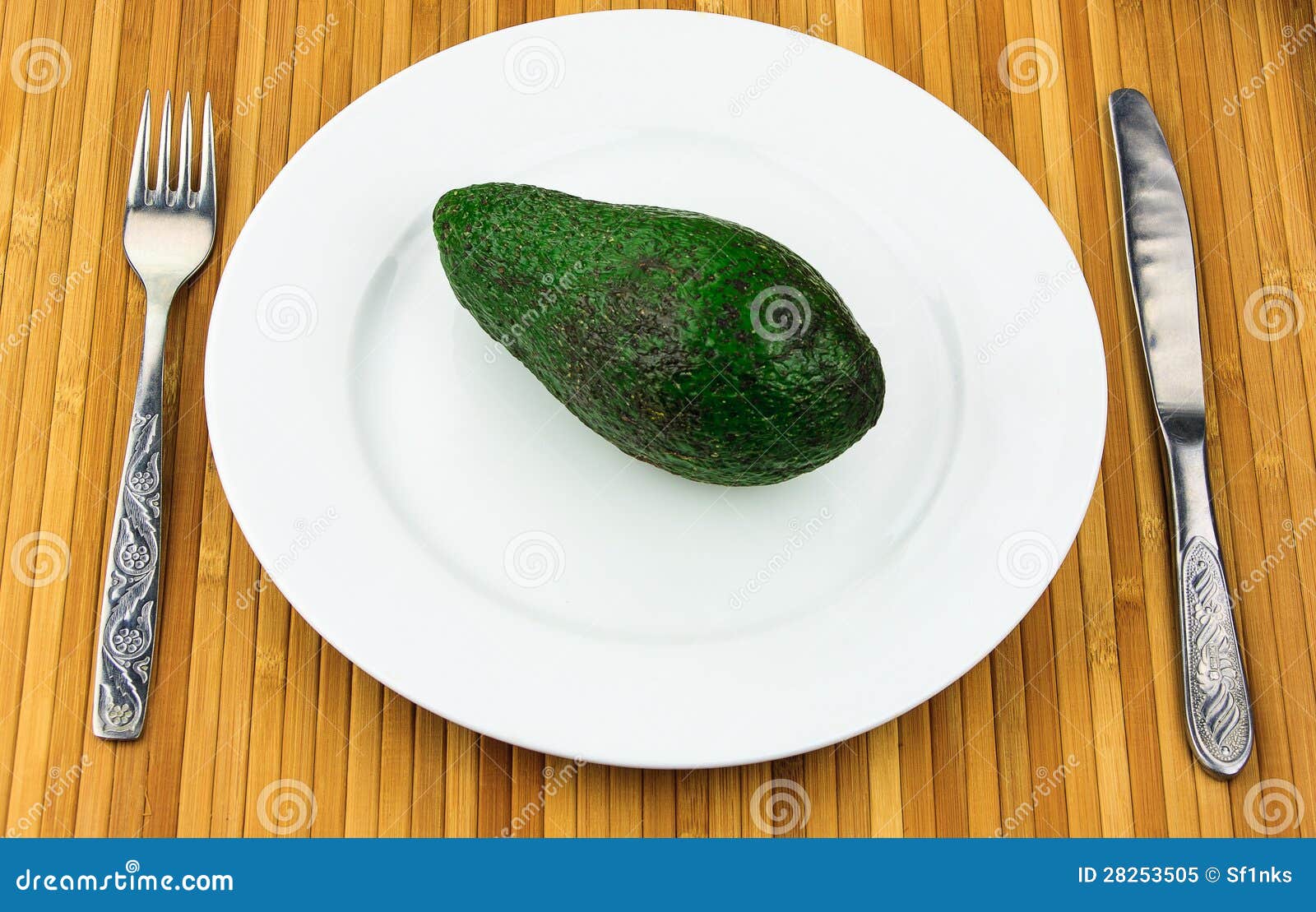 Avocado on a Plate with Cutlery Stock Image - Image of aliments, chrome ...