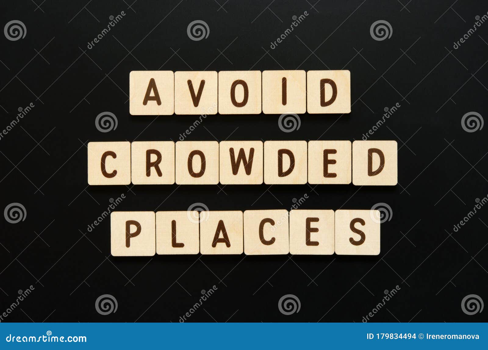 AVOID CROWDED PLACES - Words from Wooden Blocks with Letters. Top View ...
